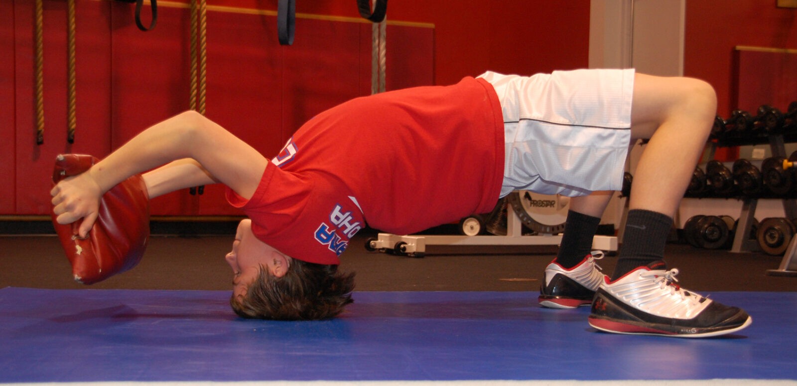 Training Technique of the Week: Sandbag Neck Bridge Pullover - WIN ...