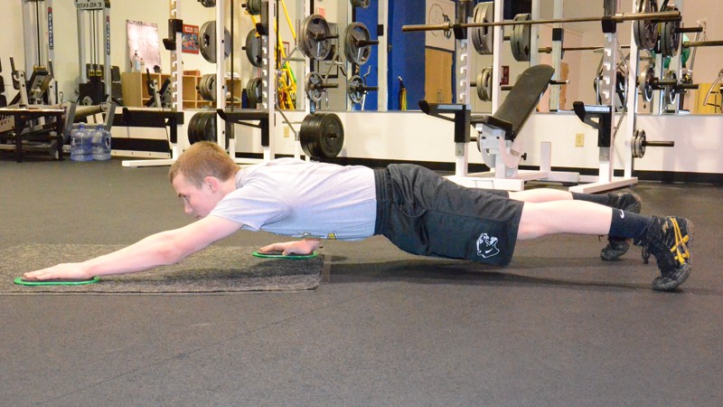 Training Technique of the Week: One-Arm Rollouts - WIN Magazine - WIN ...