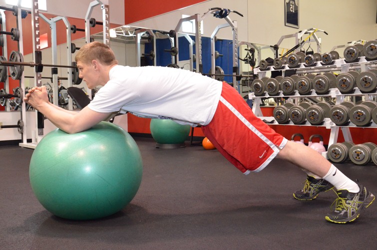 Training Technique: Stability Ball Gable-Lock Rollout - WIN Magazine ...